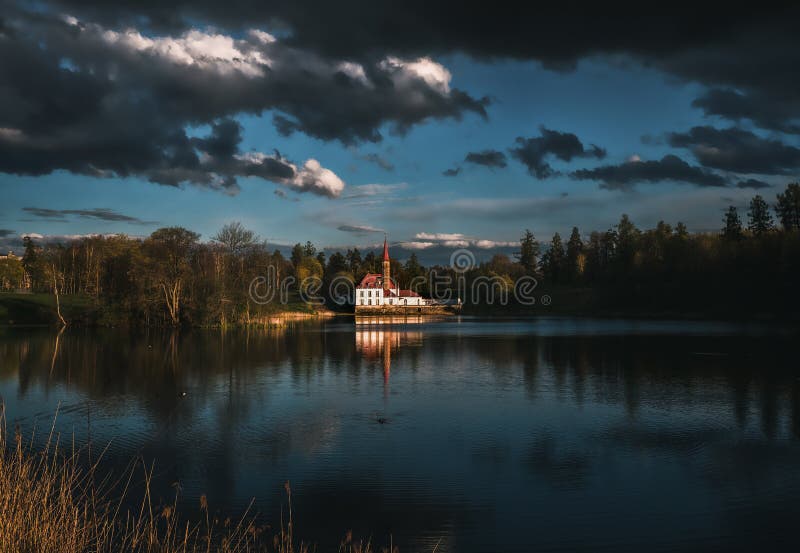 Beautiful Dramatic Landscape with a Castle by the Lake and Dark Storm ...