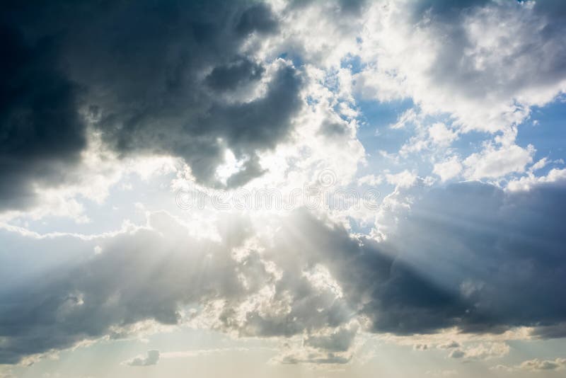 Beautiful Dramatic Sky with Sun Rays Shining through Dark Clouds for ...