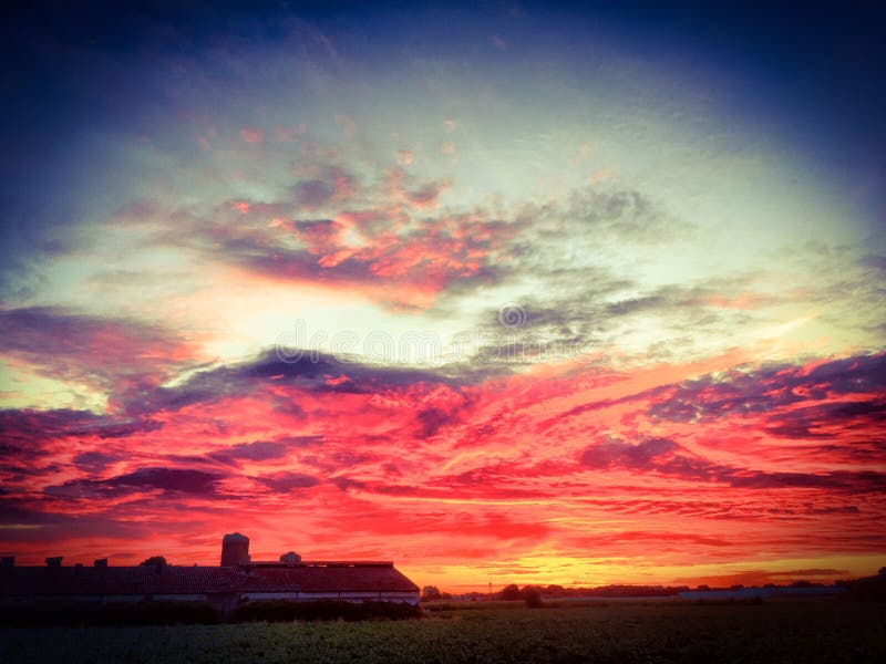 Beautiful Dramatic Sunset Over a Field Stock Photo - Image of field ...