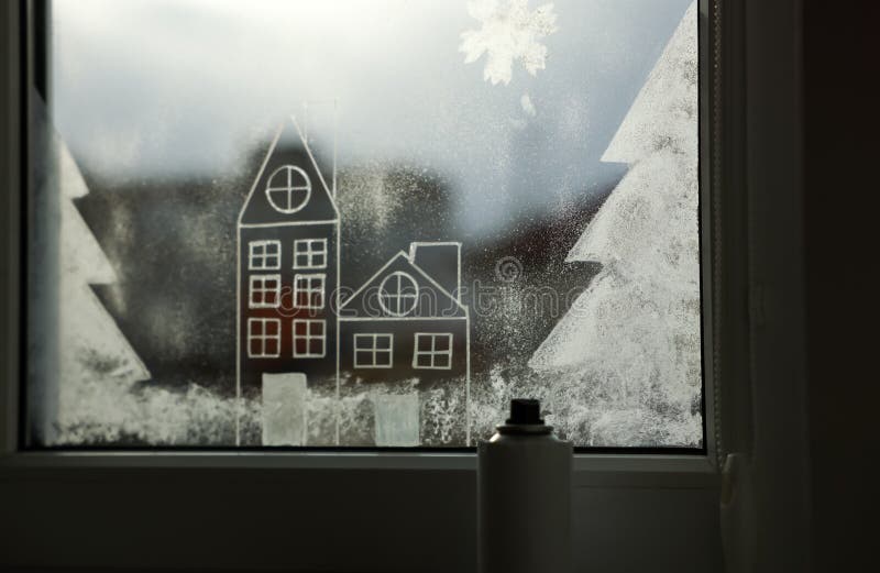Beautiful Drawing Made with Artificial Snow on Window. Christmas Decor ...