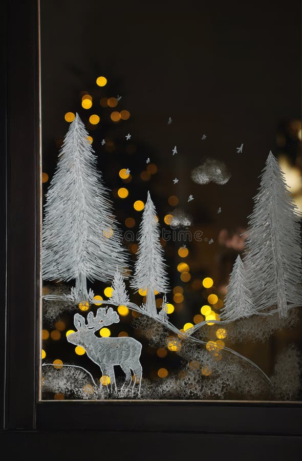 Beautiful Drawing Made with Artificial Snow on Window. Christmas Decor ...