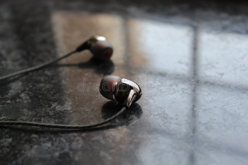 Beautiful Earphones on Marble Stock Photo - Image of jewellery, iron ...