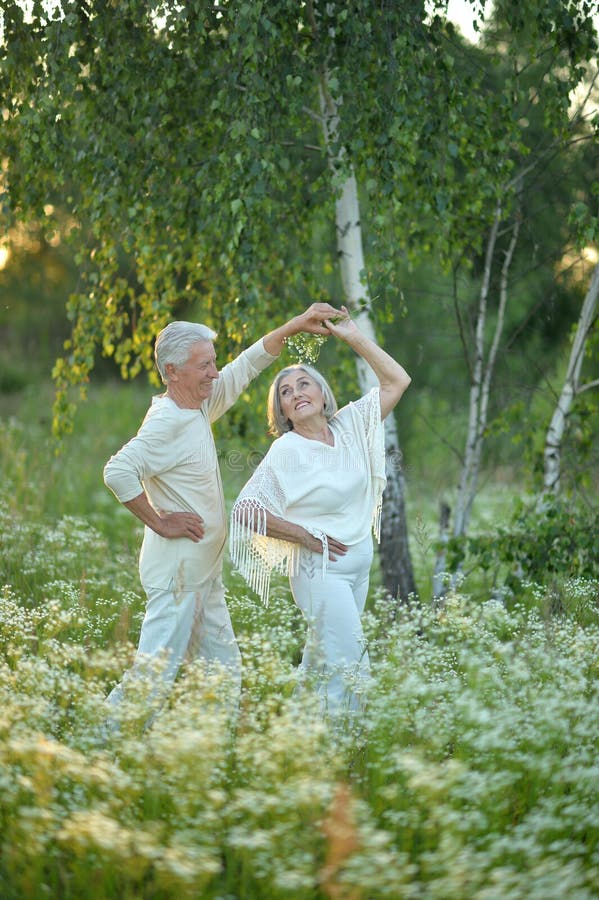 Beautiful Elderly Couple Dancing in the Park Stock Image - Image of ...