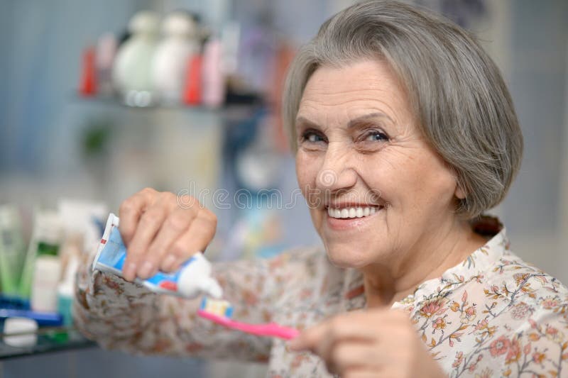 148 Beautiful Mature Woman Brushing Teeth Stock Photos - Free & Royalty ...