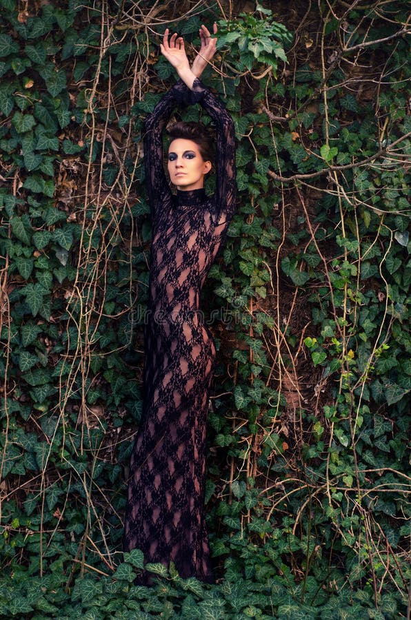 Beautiful Elegant Fashion Model Posing in the Garden Stock Photo ...