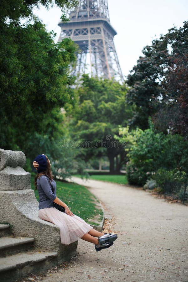Beautiful Elegant Girl in Paris on the Background of the Eiffel Tower ... Beautiful Elegant Girl in Paris on the Background of the Eiffel Tower ...