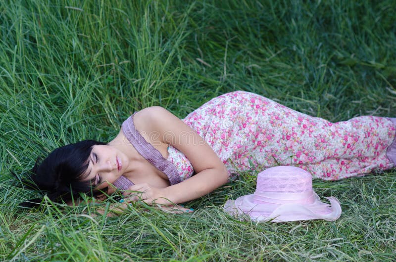 Beautiful Elegant Girl Sleeping in High Grass in Spring Stock Photo ...