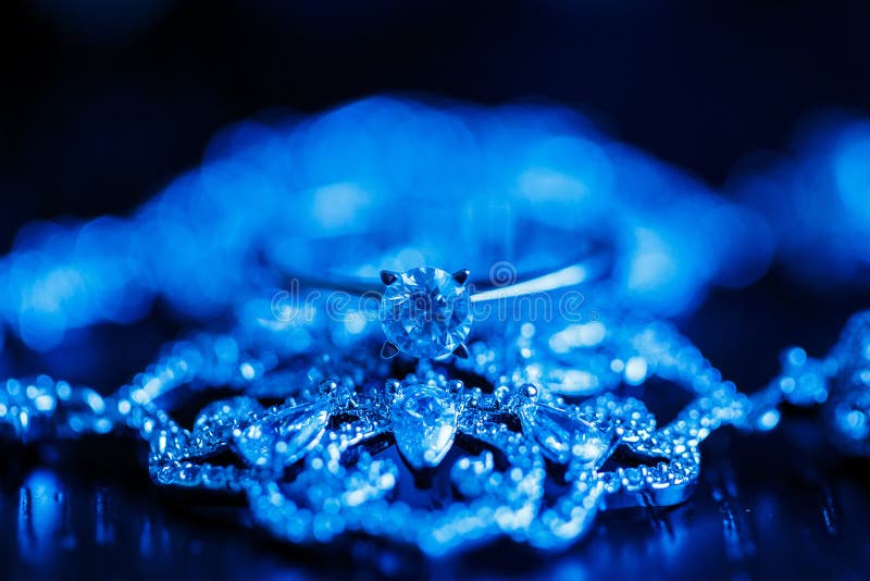 Beautiful Engagement Ring with Blue Neon Lights Stock Image - Image of ...