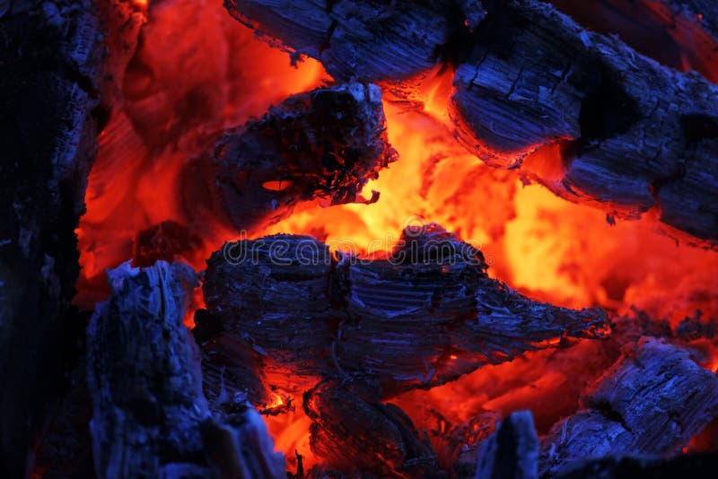 A Beautiful Evening Fire Melting Away with Red Coals. Stock Image ...