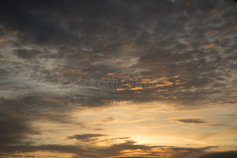 Beautiful Evening Sky Background with Golden and Silver Clouds Stock ...