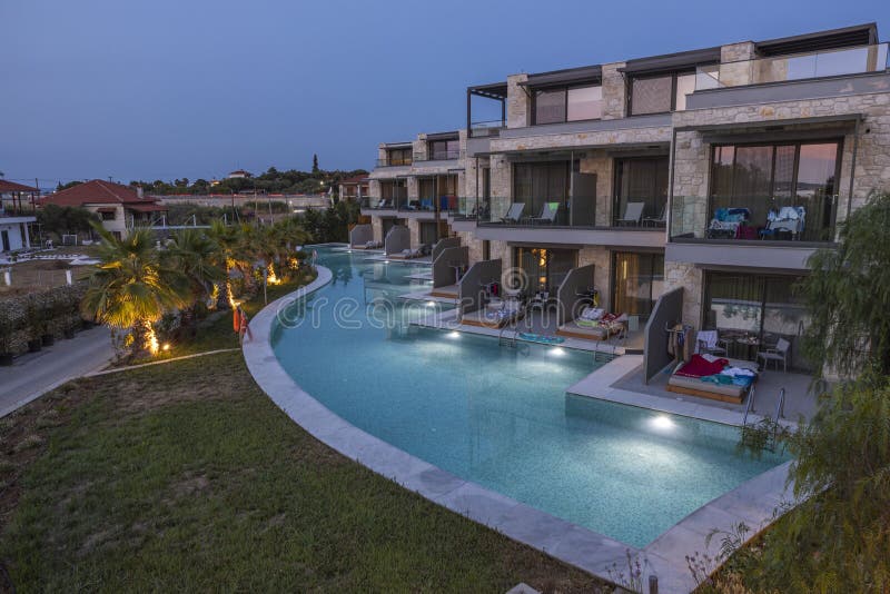 Beautiful Evening View of Hotel Rooms with Own Pool. Greece Stock Photo ...