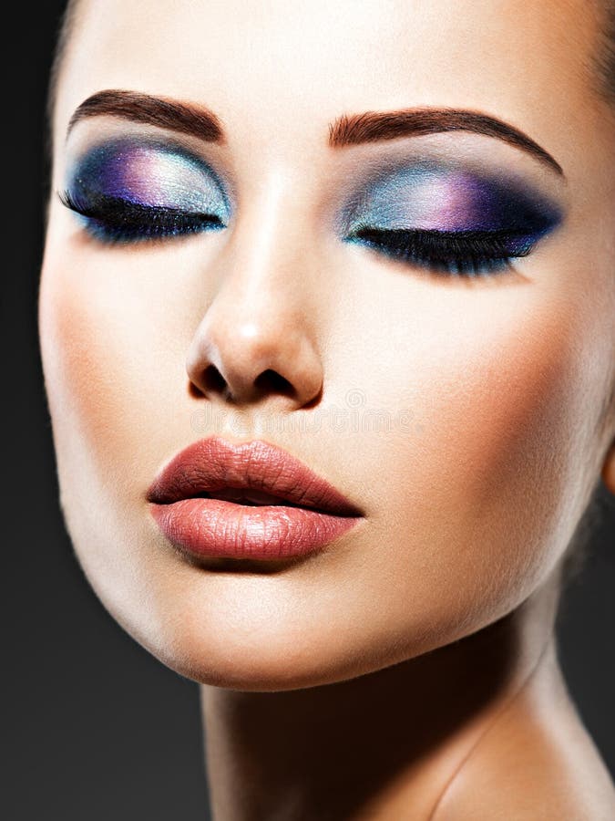 Beautiful Face of an Young Woman with Blue Makeup of Eyes Stock Image ...