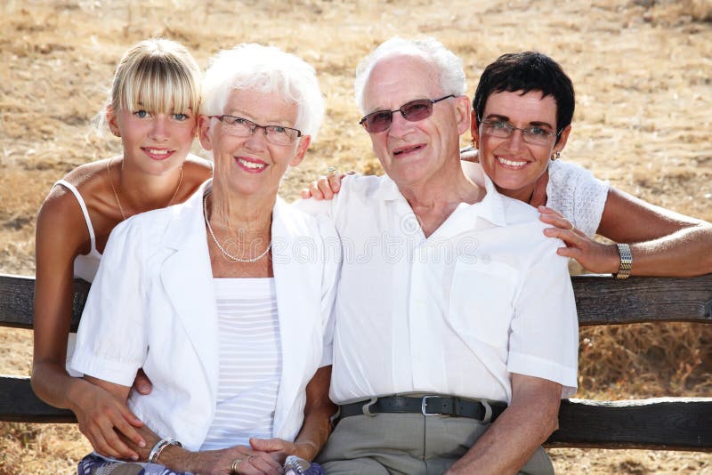 Beautiful family of four stock photo. Image of happy, front - 7896132