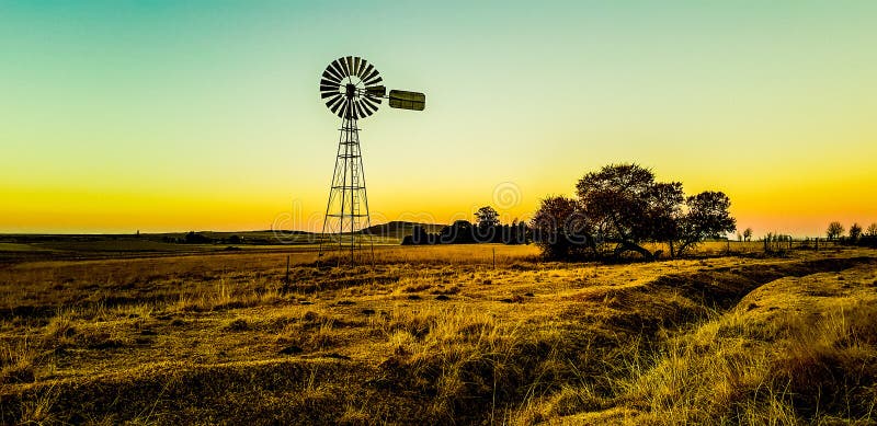 Farm Sunset Windmill stock photo. Image of beautiful - 132723788