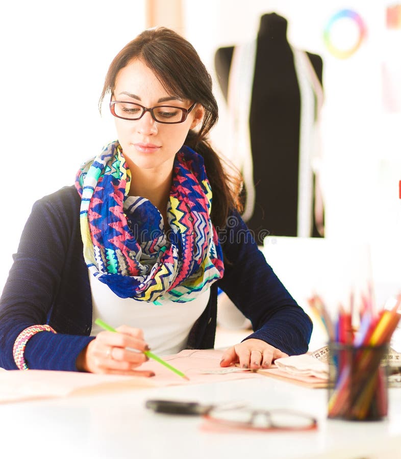 Beautiful Fashion Designer Sitting at the Desk in Studio . Stock Image ...