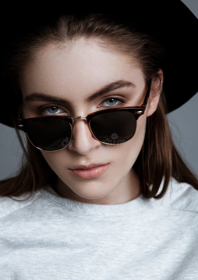 Beautiful Fashion Model with Glasses and Black Hat Stock Photo - Image ...