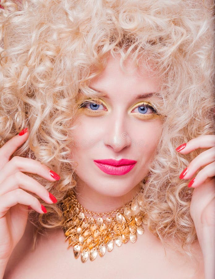 Beautiful Fashionable Blonde Girl In Retro Style With Voluminous Curly