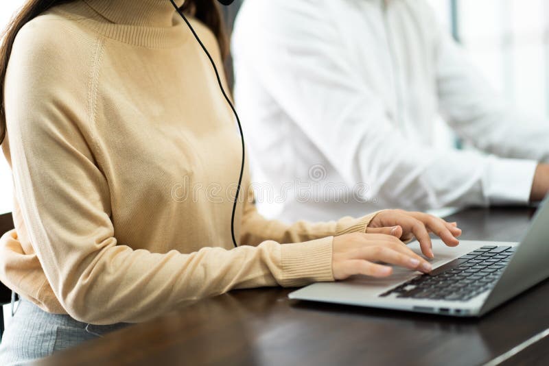 Beautiful Female Call Center Operator Working on Computer in Office ...