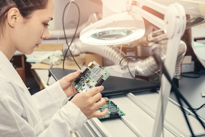 Beautiful Female Computer Expert Professional Technician Examining ...