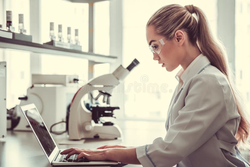 Beautiful Female Doctor in Laboratory Stock Photo - Image of chemistry ...