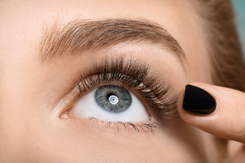 Beautiful Female Eye with Long Eyelashes Stock Photo - Image of finger ...