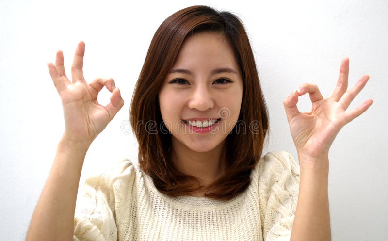 Beautiful Female Giving Okay Sign Stock Photo - Image of business ...
