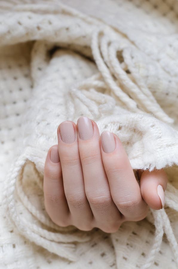 Beautiful Female Hand with Beige Nail Design Stock Image - Image of ...