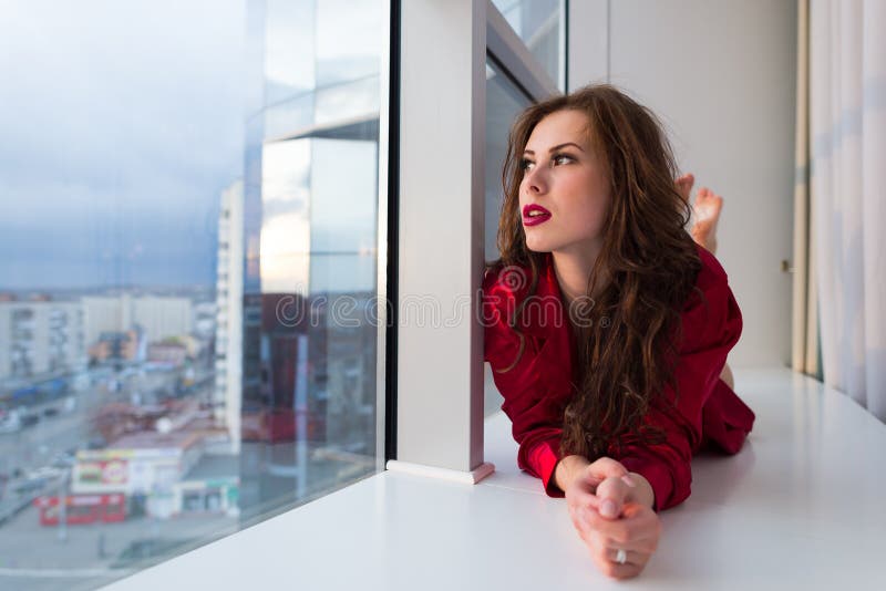 Beautiful Female Having Fun Relaxing Looking Out the Window, Portrait ...