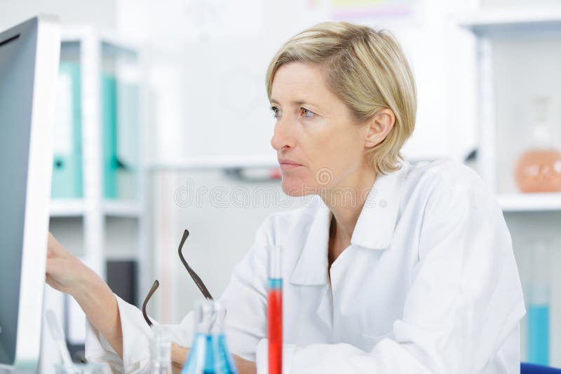 Beautiful Female Lab Worker Analyzing Tests Stock Image - Image of ...