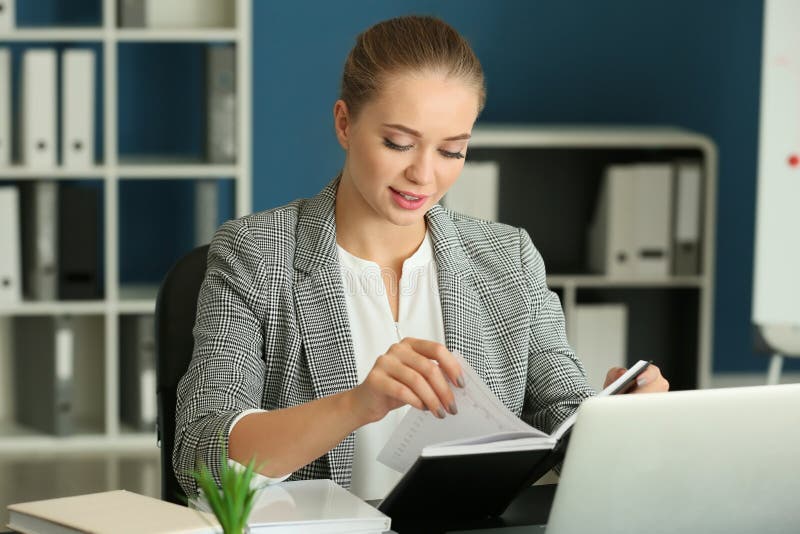 Beautiful Female Secretary Working in Office Stock Photo - Image of ...