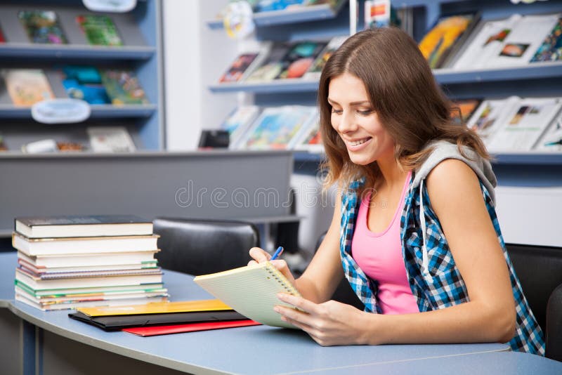 Beautiful Female Student in a Library Stock Image - Image of classroom ...