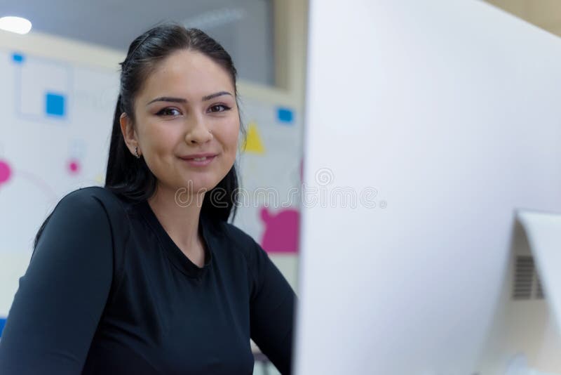 Beautiful Female it Student Working at Her Computer Lab. Female ...