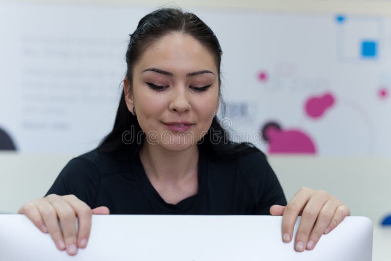 Beautiful Female it Student Working at Her Computer Lab. Female ...