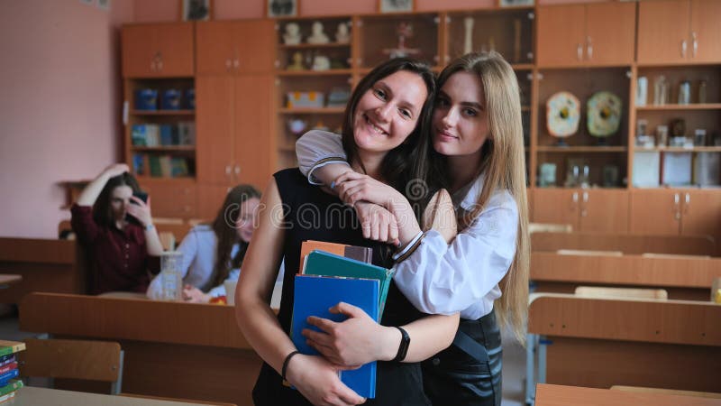 Beautiful Female Students are Posing in the Class. Stock Image - Image ...