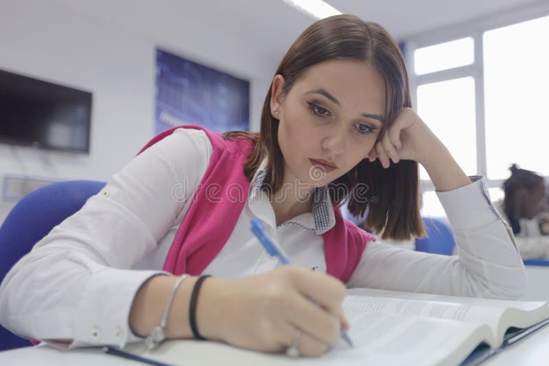 Beautiful Femele Student Taking Notes in the Classroom Stock Photo ...