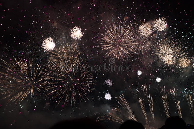 Multiple Fireworks in Night Sky in a Composition in Shades Gold Stock ...