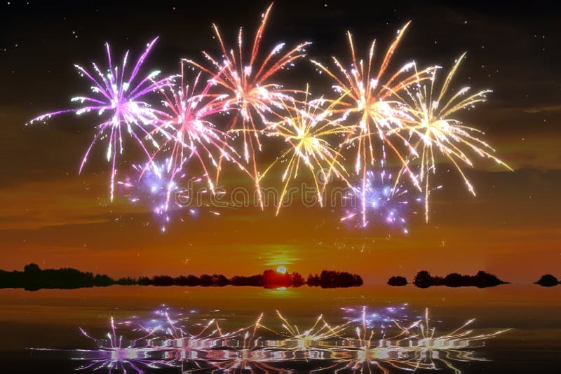 Beautiful Fireworks in Front of a Sunset at the Beach Stock Photo ...