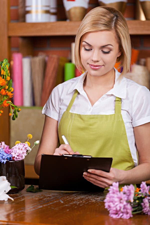 Beautiful Florist Woman Holds a Bouquet Stock Photo - Image of standing ...