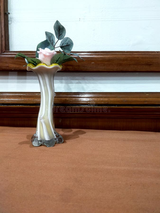 Beautiful Flower in a Unique Pot on the Table Stock Photo - Image of ...