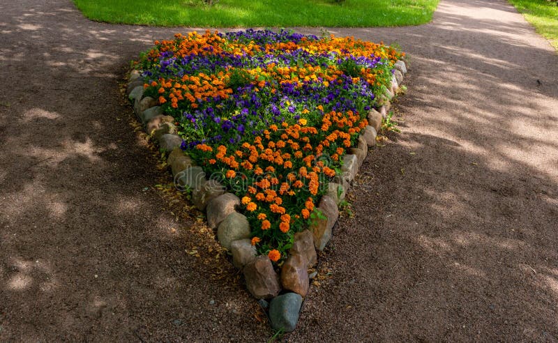 Beautiful Flowerbed in the Shape of a Drop of Bright Garden Flowers ...