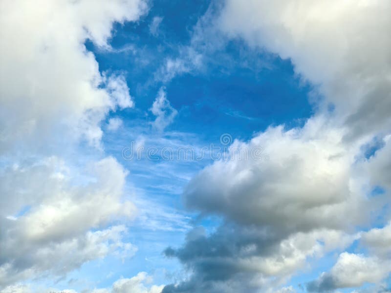 Beautiful Fluffy White Cloud Formations in a Deep Blue Summer Sky Stock ...