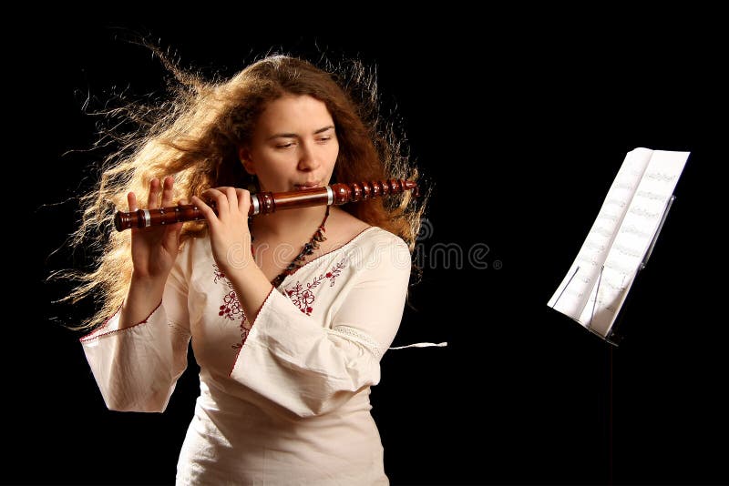 Beautiful Flutist stock image. Image of melody, enjoy, enjoying - 92363