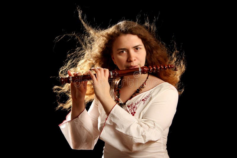 Beautiful Flutist stock image. Image of melody, enjoy, enjoying - 92363