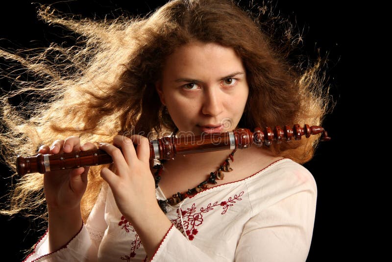 Beautiful Flutist stock image. Image of melody, enjoy, enjoying - 92363