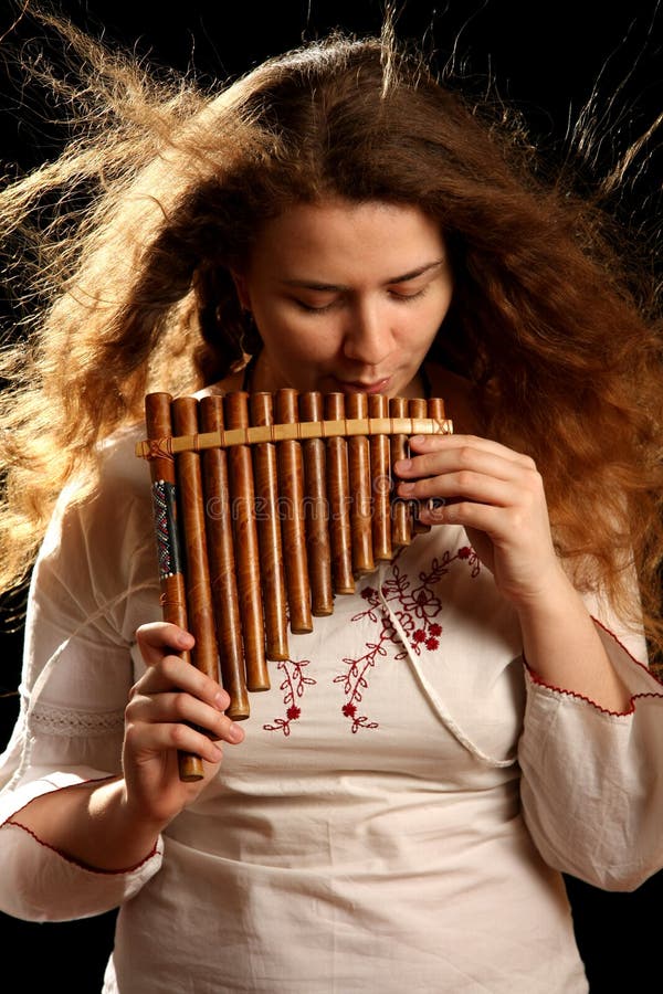 Beautiful Flutist stock image. Image of melody, enjoy, enjoying - 92363