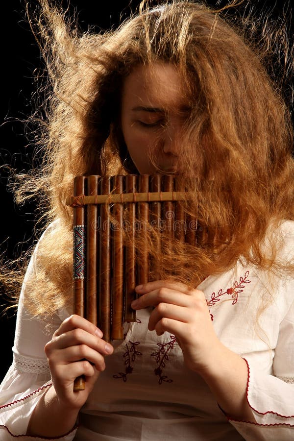 Beautiful Flutist stock image. Image of melody, enjoy, enjoying - 92363