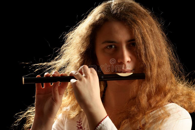 Beautiful Flutist stock image. Image of melody, enjoy, enjoying - 92363