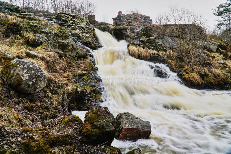 Beautiful Foamy Cascade Flowing Down a Mossy Rock Formation Stock Image ...