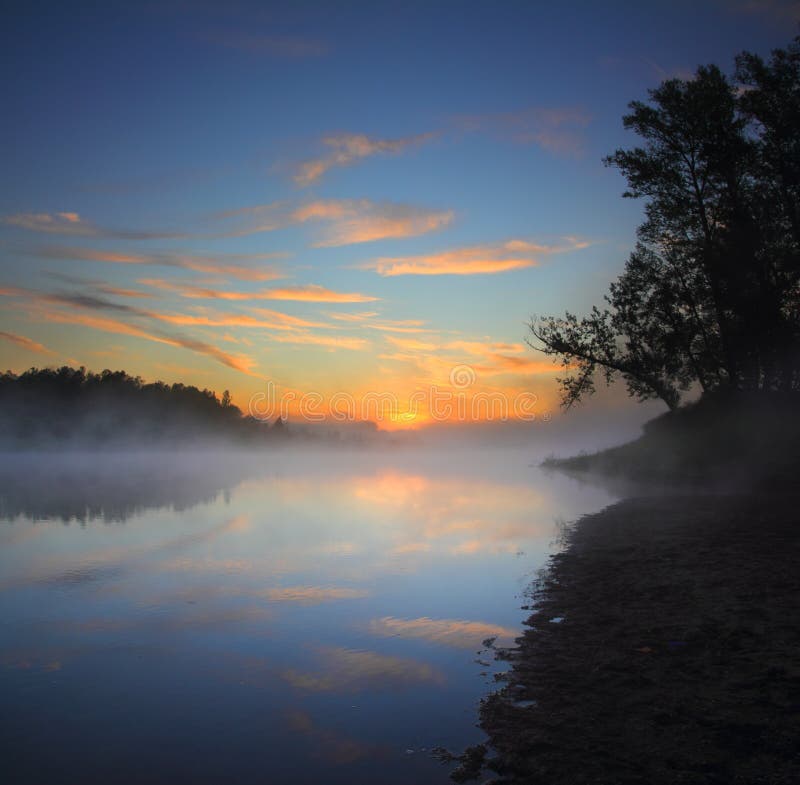 Mist over water stock image. Image of serene, golden, light - 5669915