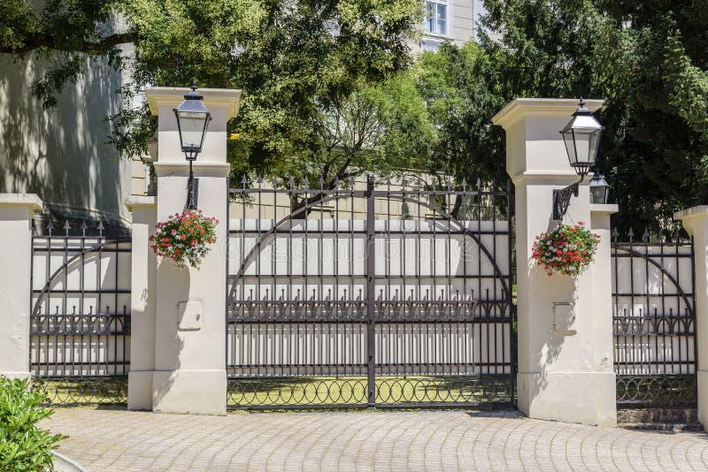 Beautiful Forged Gates with Stone Columns. Stock Image - Image of steel ...
